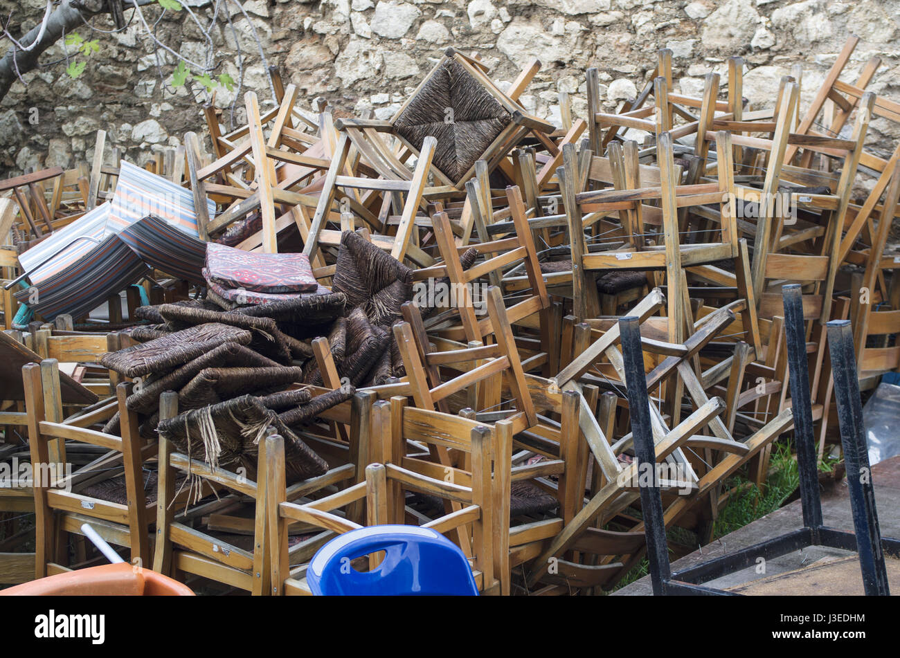 Old chairs pile hi-res stock photography and images - Alamy