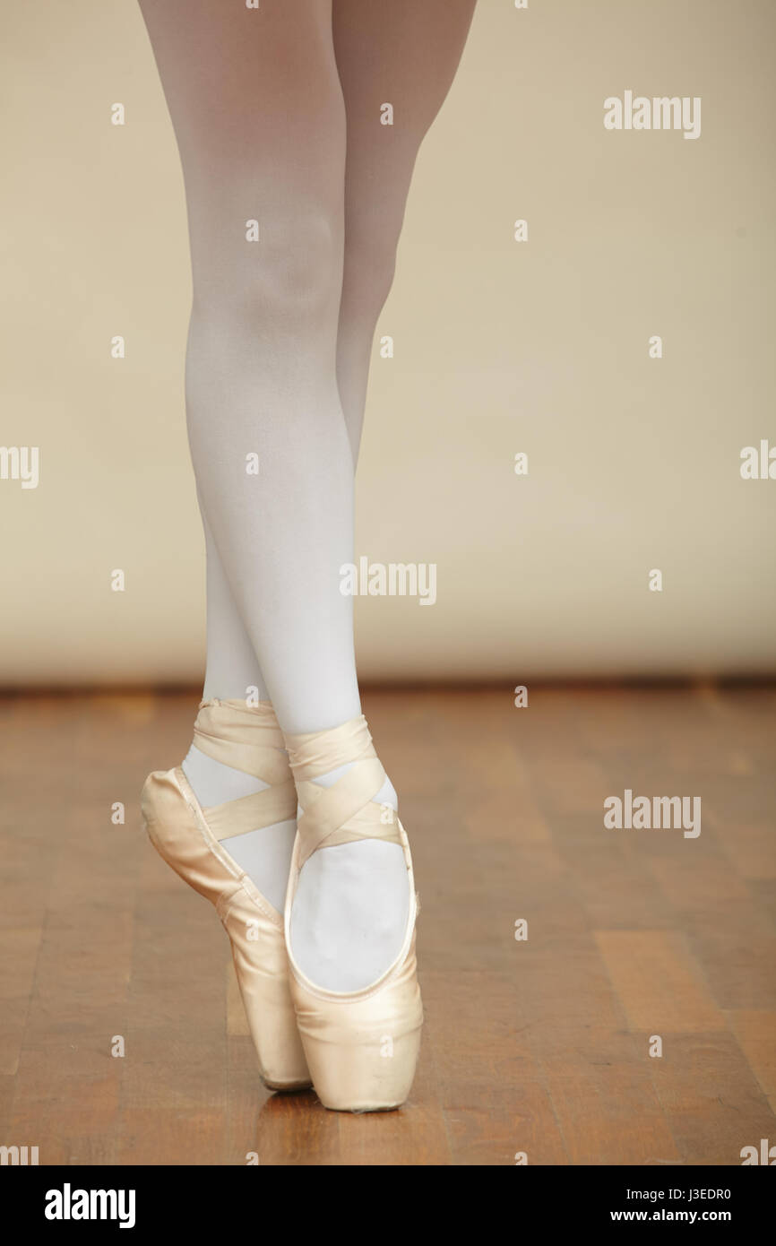 Closeup of ballerina's legs with ballet shoes Stock Photo - Alamy