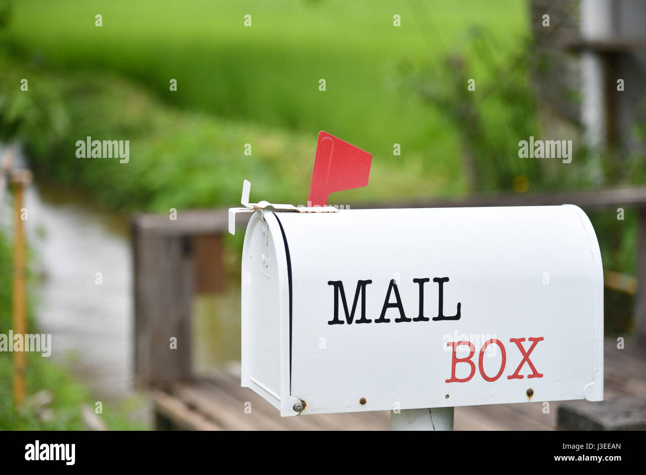 White Mail Box in Front of a House Stock Photo - Alamy