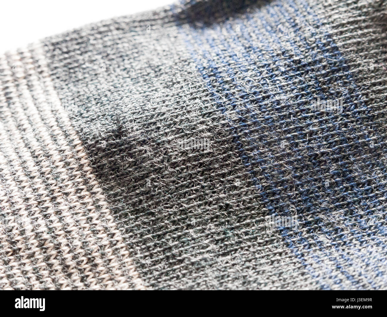 close up texture of warm soft socks made of cotton wool blue and ...