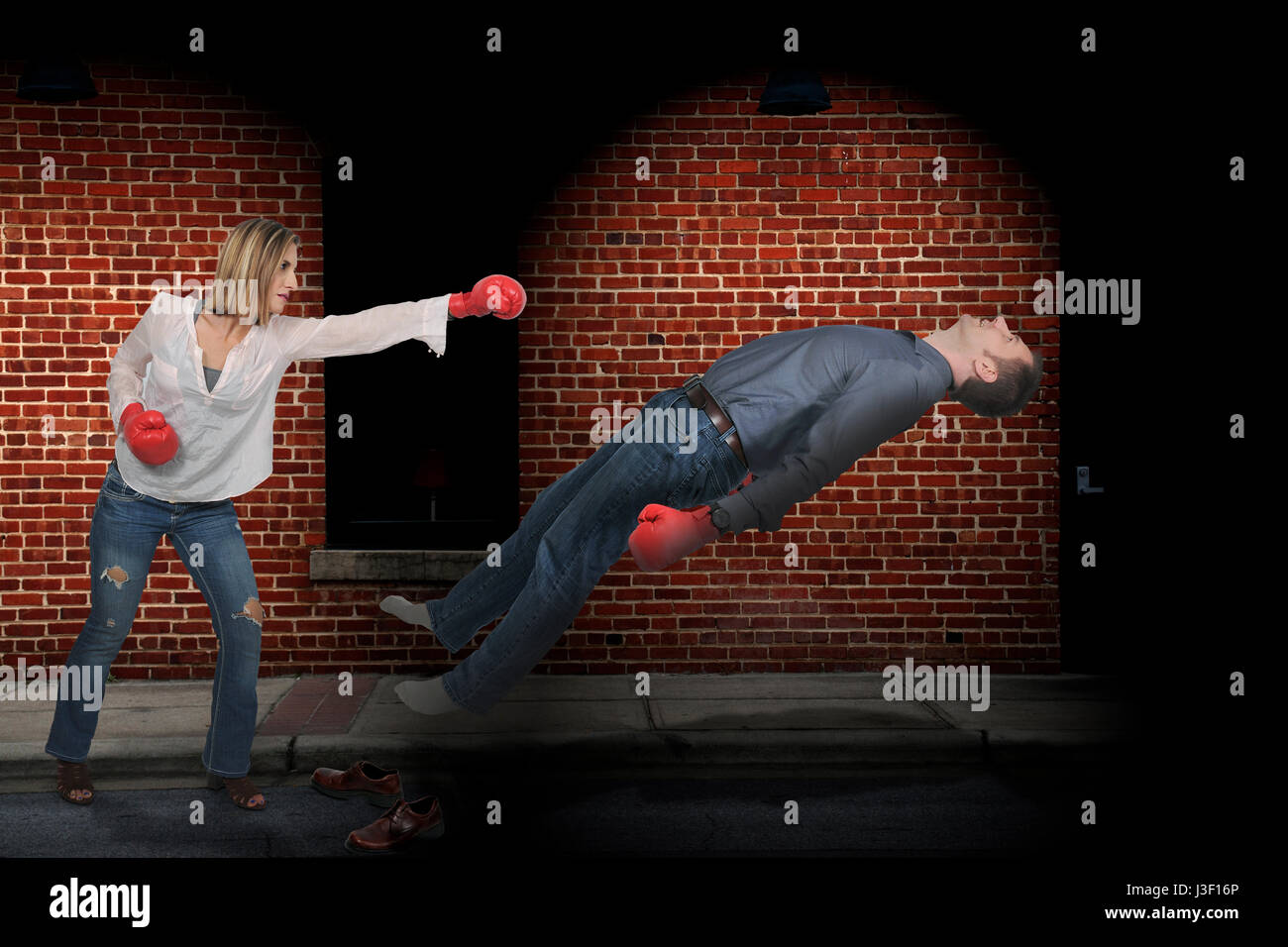 Handsome man boxer who has just taken a knockout punch Stock Photo - Alamy