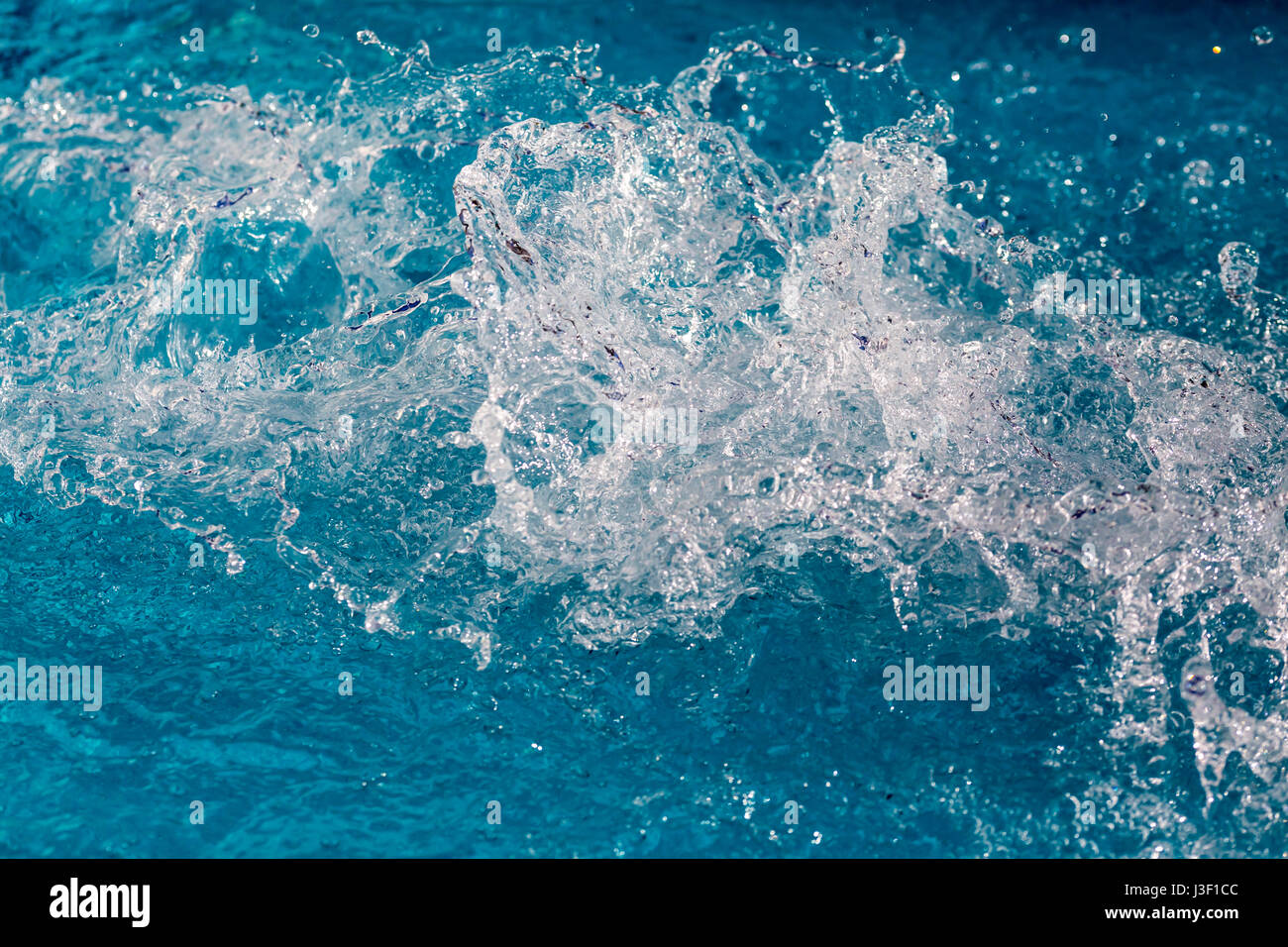 Water splash in swimming pool with blue floor. Fresh background Stock ...