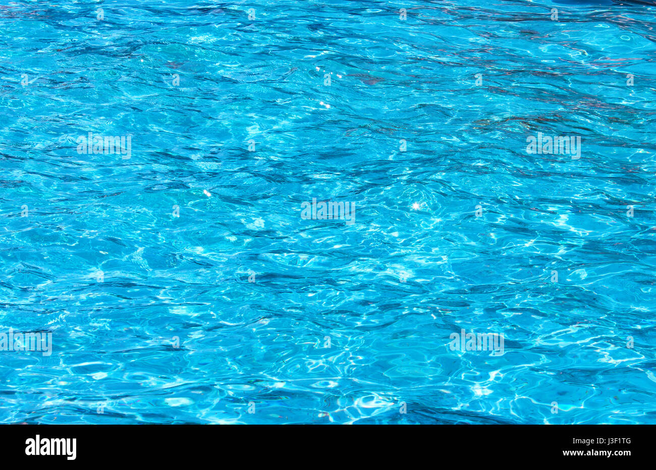 Close-up photo of blue clean water waves and shiny reflections Stock ...