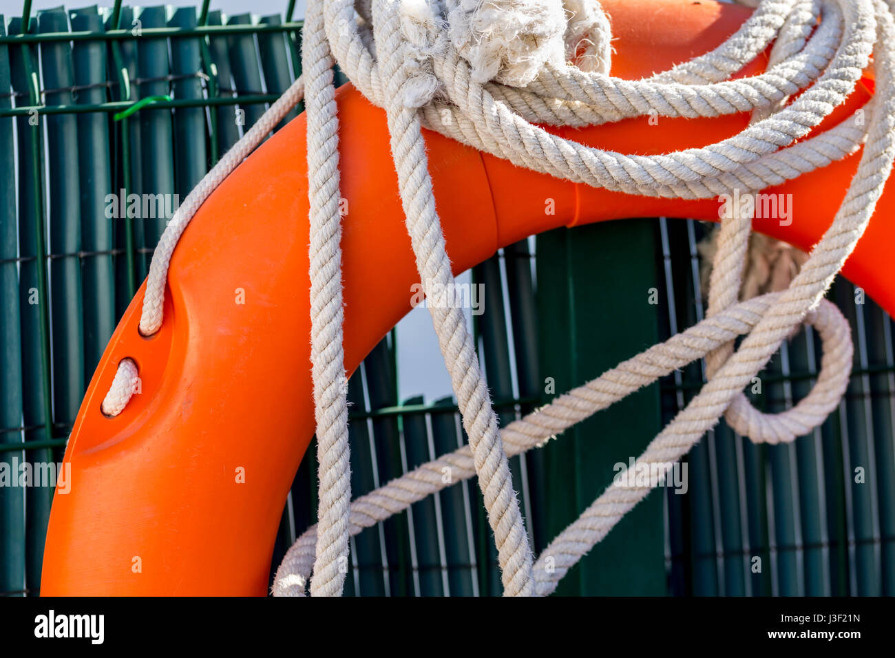 White rope and float in the lifeguard post of a swimming pool Stock ...