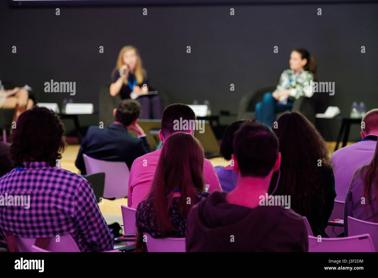Audience at conference hall Stock Photo - Alamy