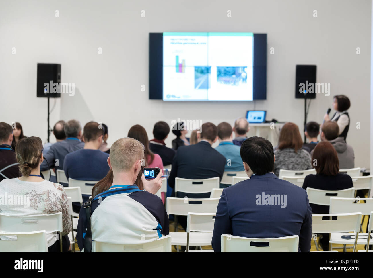 Audience at conference hall Stock Photo - Alamy