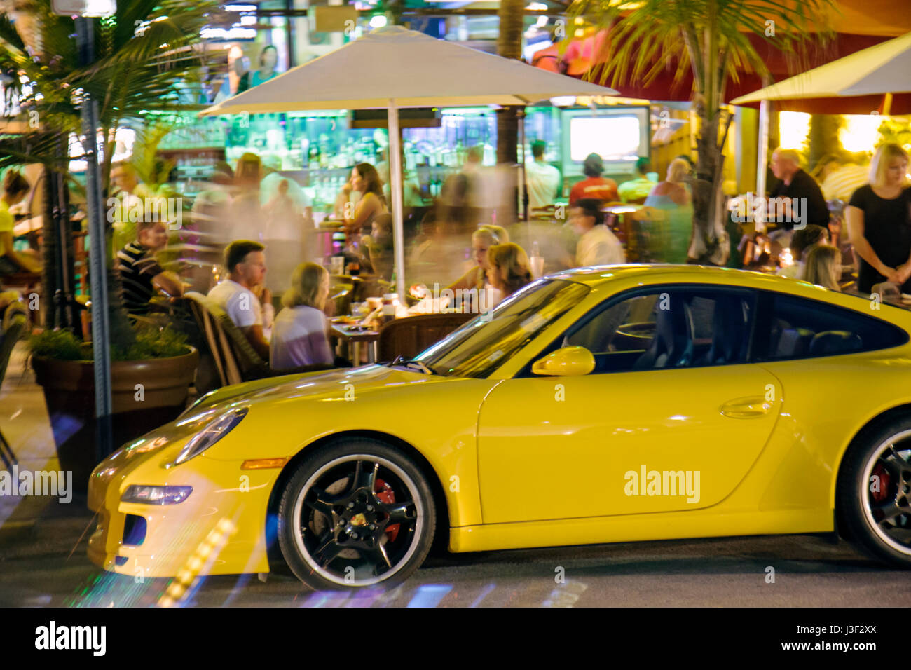 Miami Beach Florida,Ocean Drive,yellow,car cars,Porsche,street,sidewalk ...