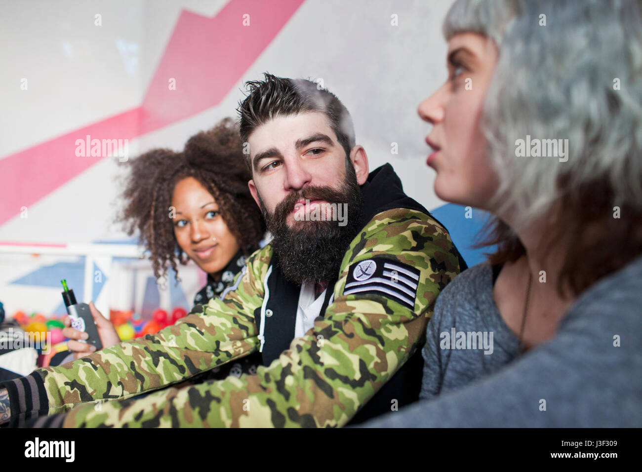 Young friends smoking Stock Photo - Alamy