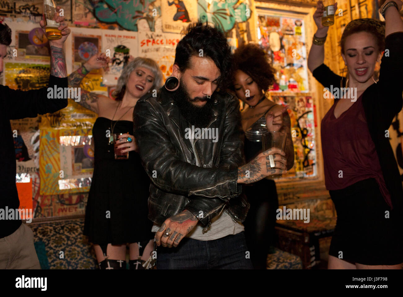 Friends dancing at a nightclub Stock Photo - Alamy