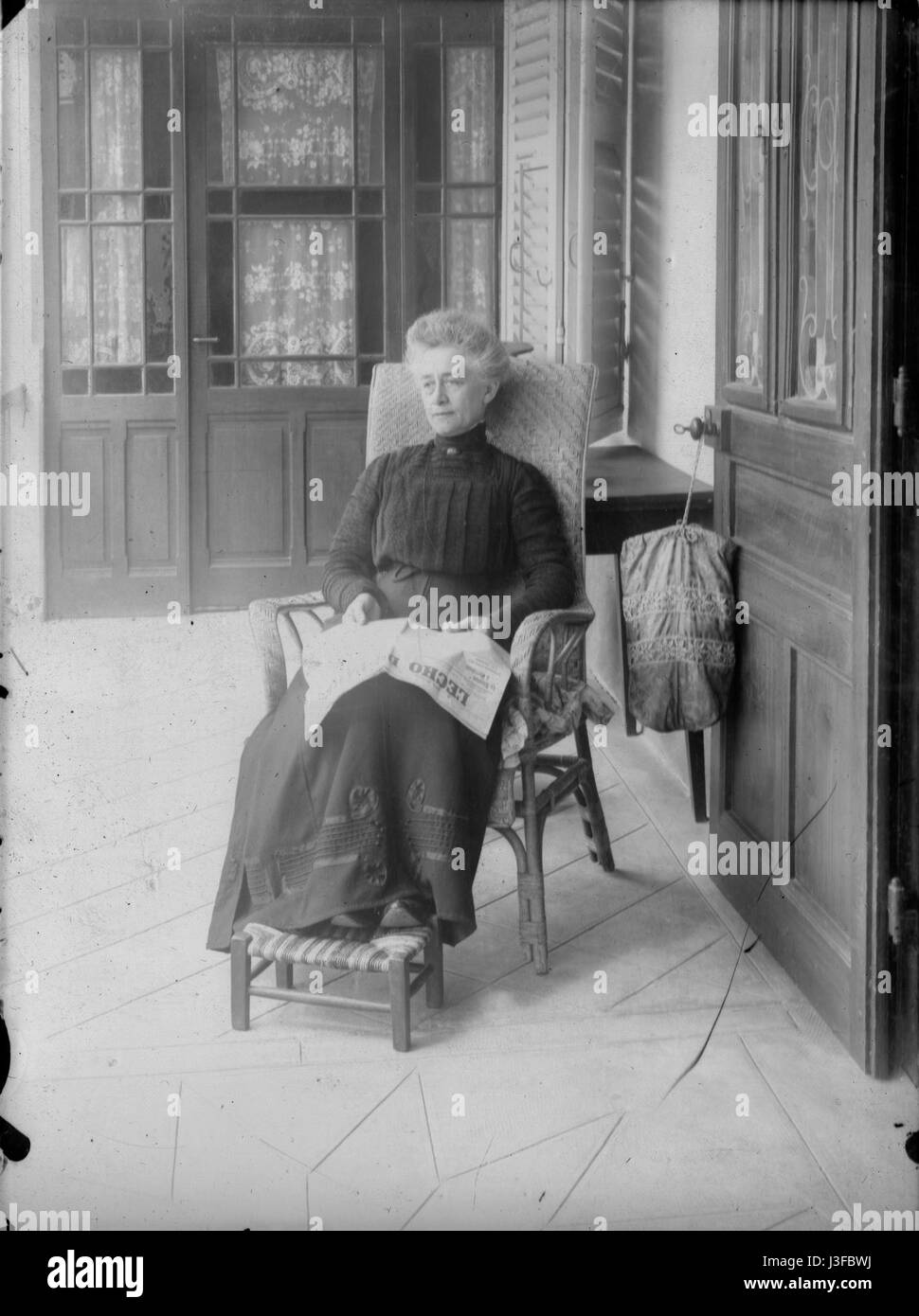 A portrait titled 'Femme au journal pos' depicting a woman with a ...