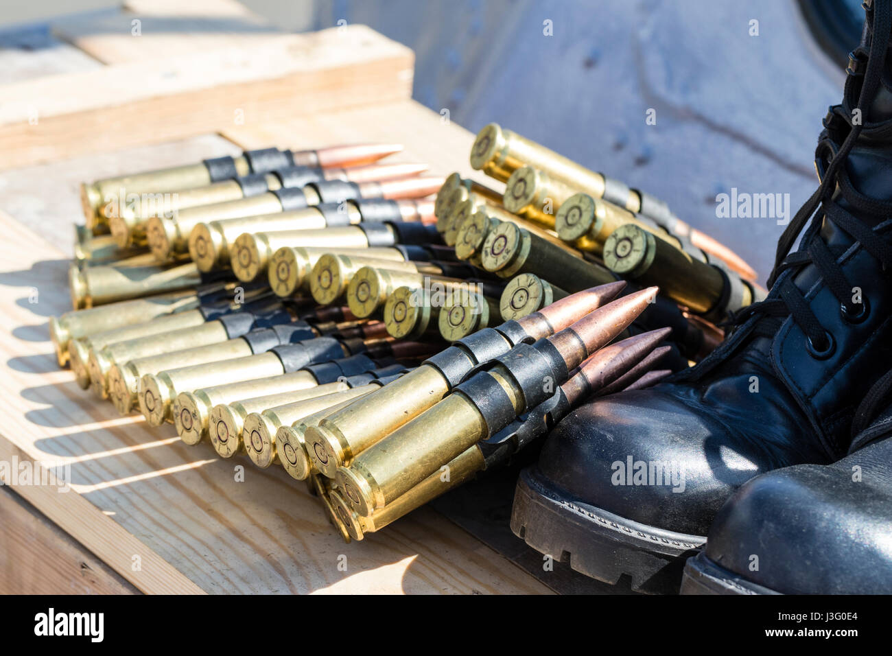 World war two circa Machine gun Canon shells laying next to boot Stock ...