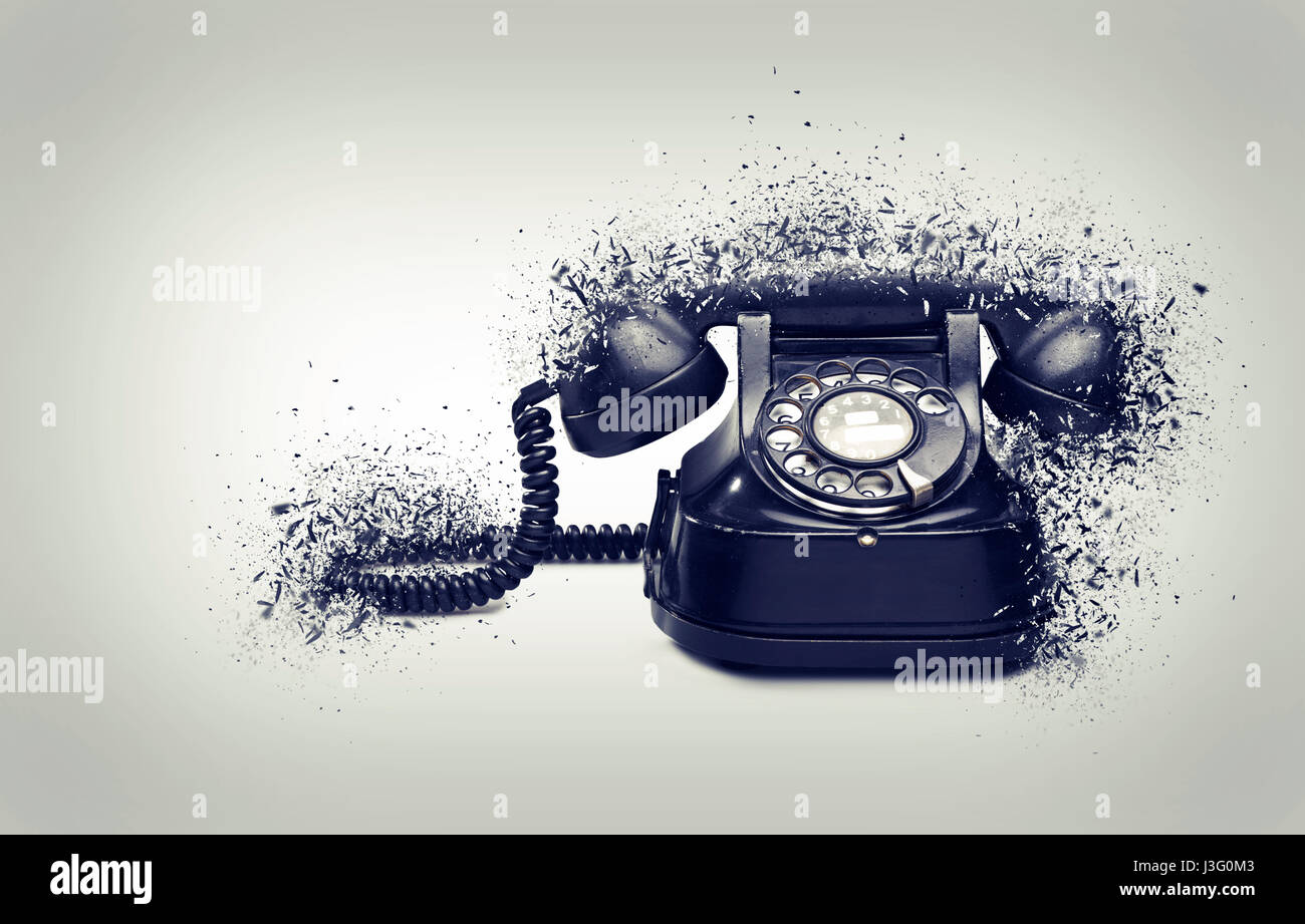 Old and vintage telephone shattered Stock Photo - Alamy
