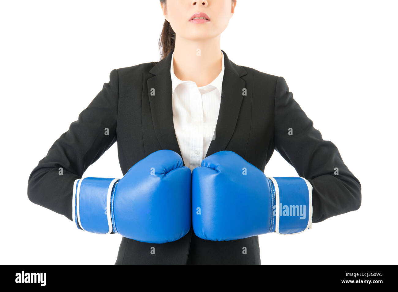 rage businesswoman wearing boxing gloves ready for the competition ...