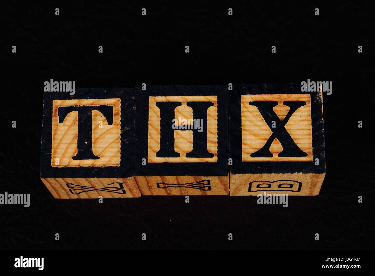 The term thx visually displayed on a black background using colorful ...