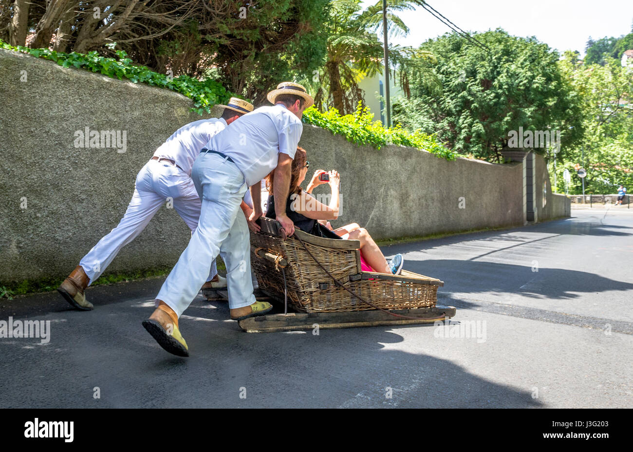 The traditional wicker basket toboggan used to carry tourist down from ...