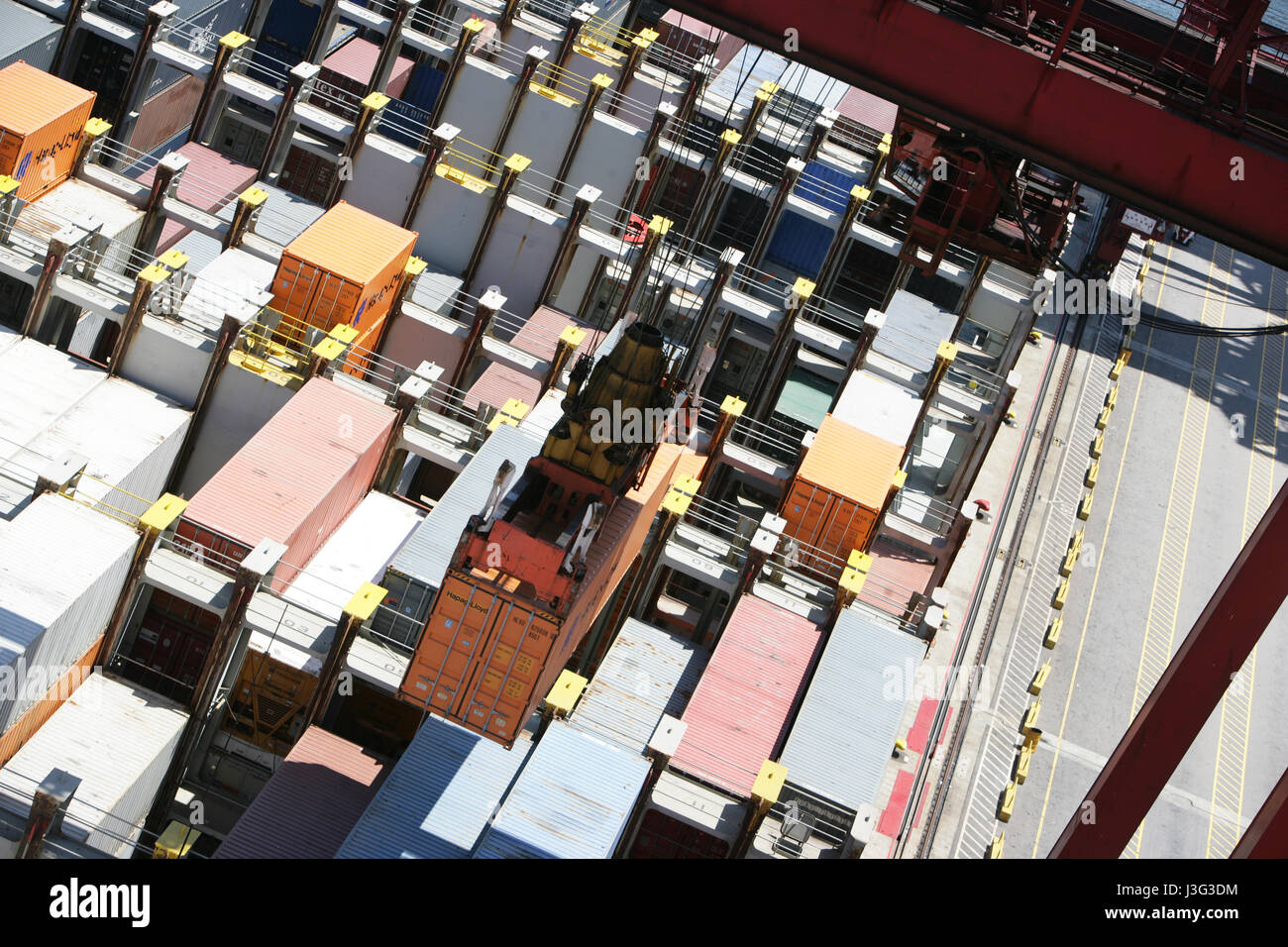Containers stacked on a ship ready to be transported Stock Photo - Alamy