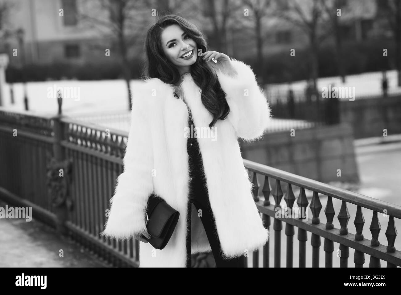 Person in red coat Black and White Stock Photos & Images - Alamy