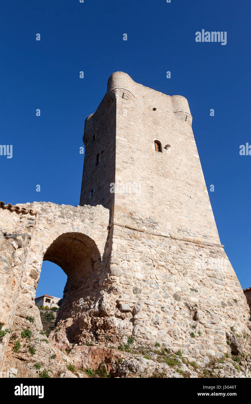 typical ancient Mani tower and blue sky in Greek town of kardamili on ...