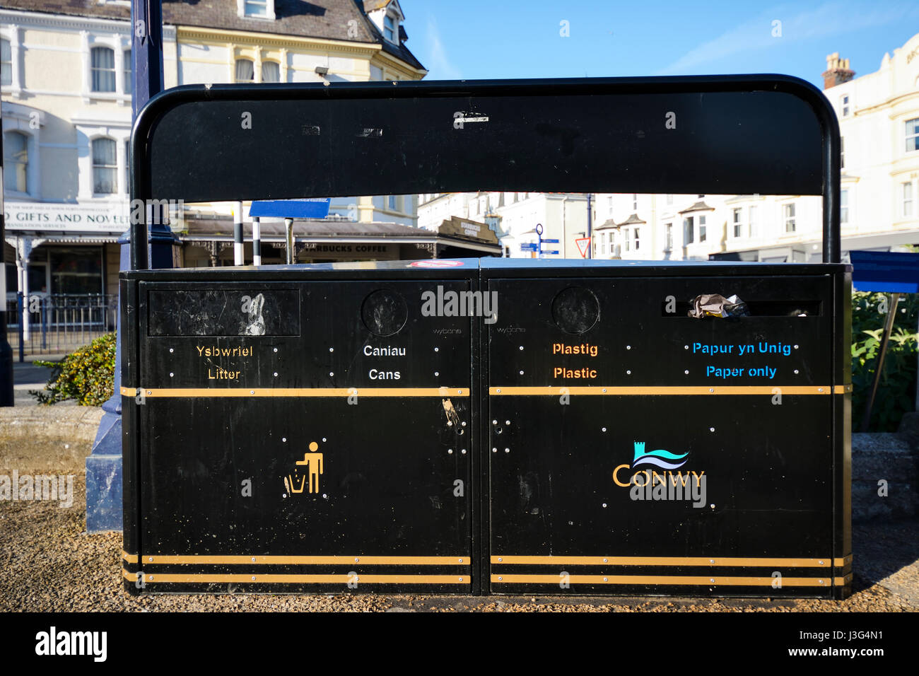 Bilingual recycle bins in Llandudno, Clwyd, North Wales, a popular ...