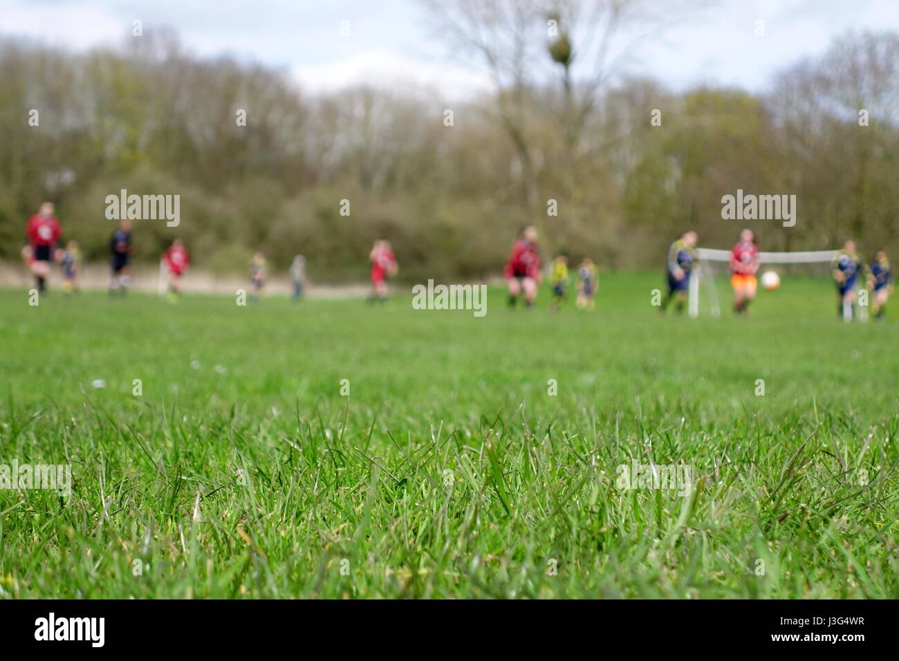 Girls football match Stock Photo - Alamy
