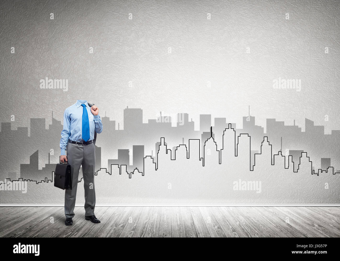 Headless engineer man with case in hand against construction background ...