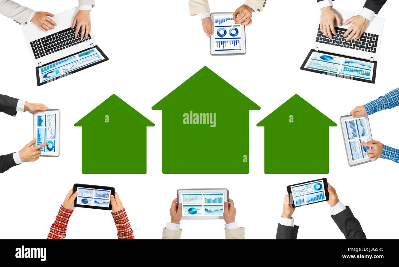 Group of people with devices in hands working together as symbol of ...