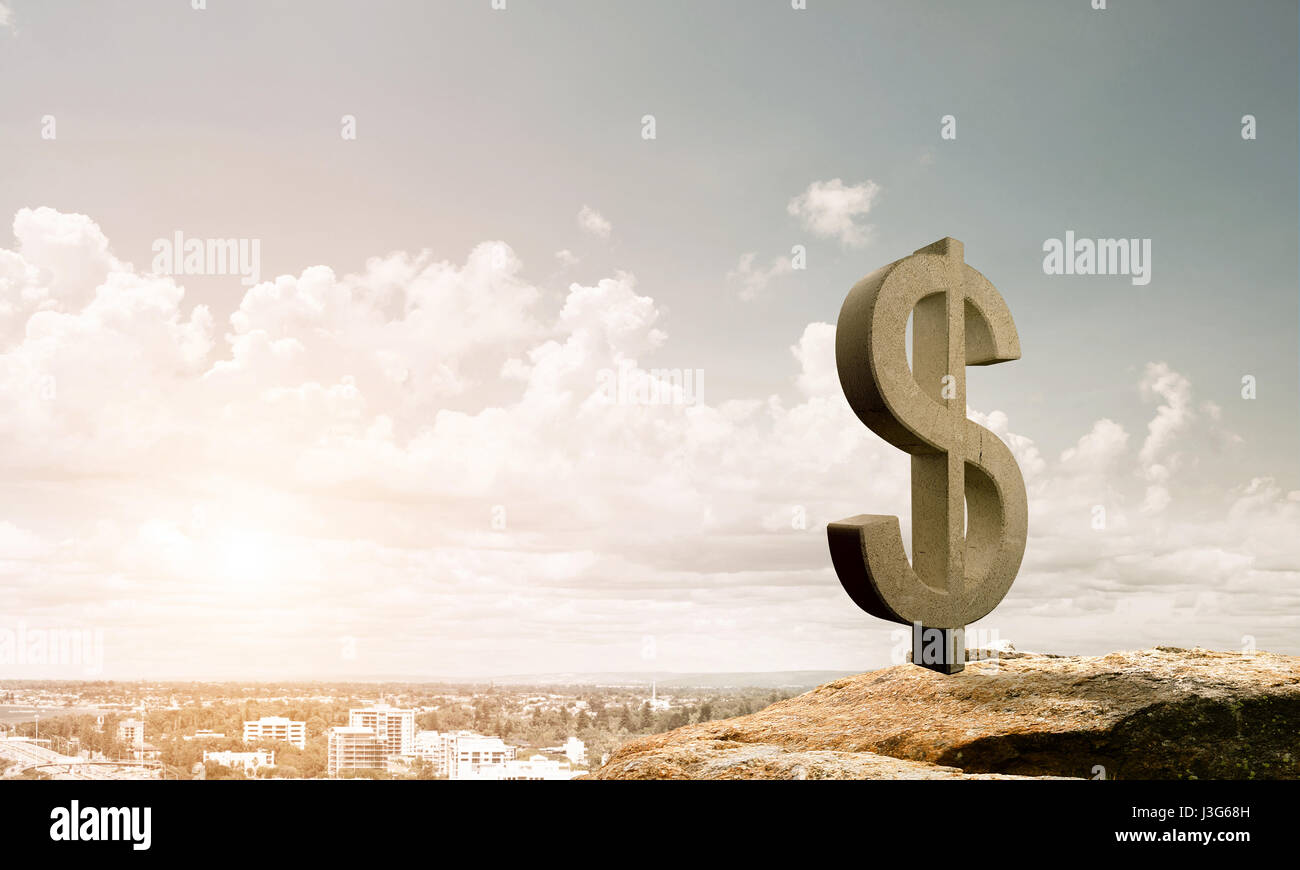 Stone dollar symbol outdoors on green hill as currency sign Stock Photo ...