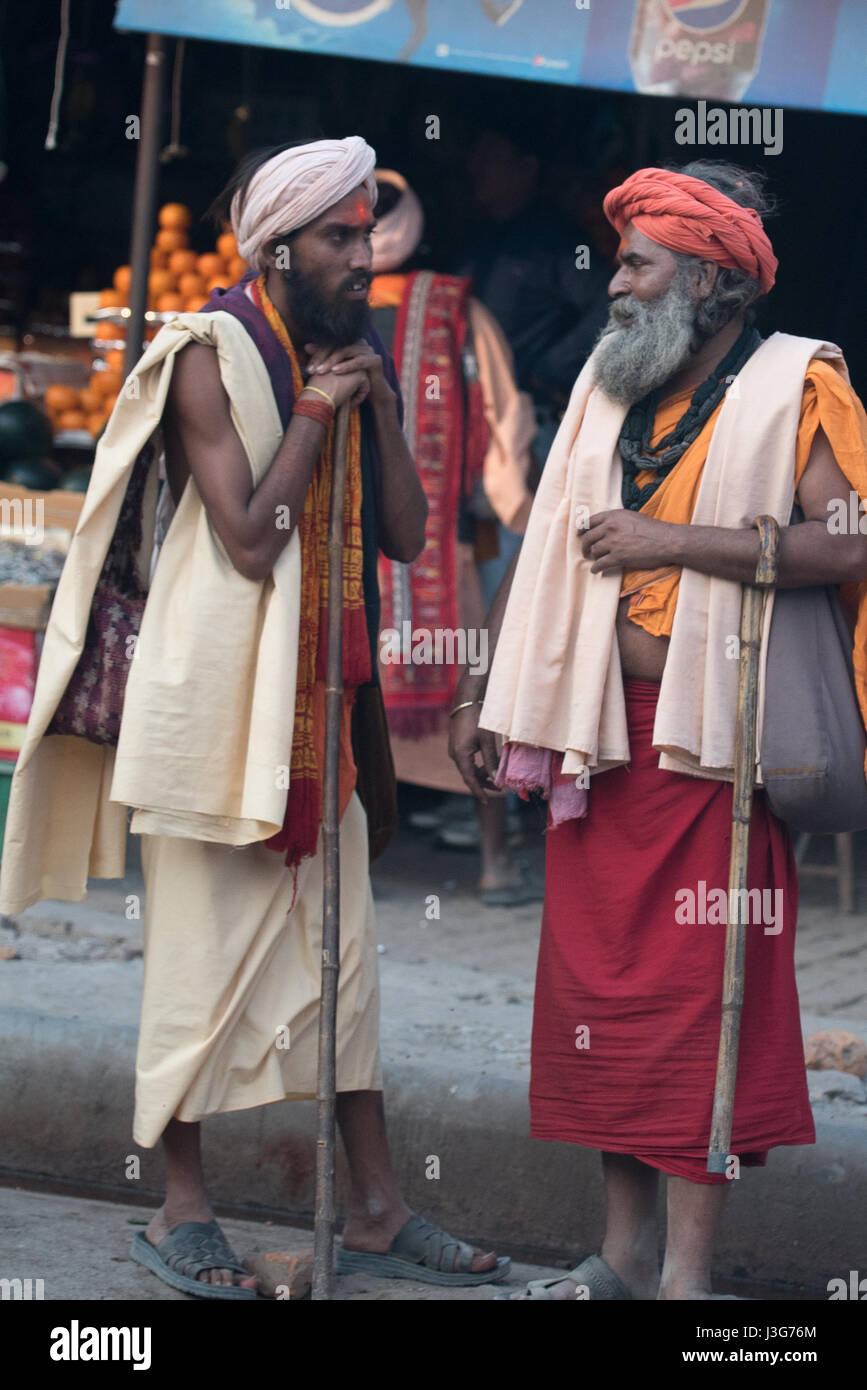 Two pilgrims having a conversation in Varanasi, India Stock Photo - Alamy