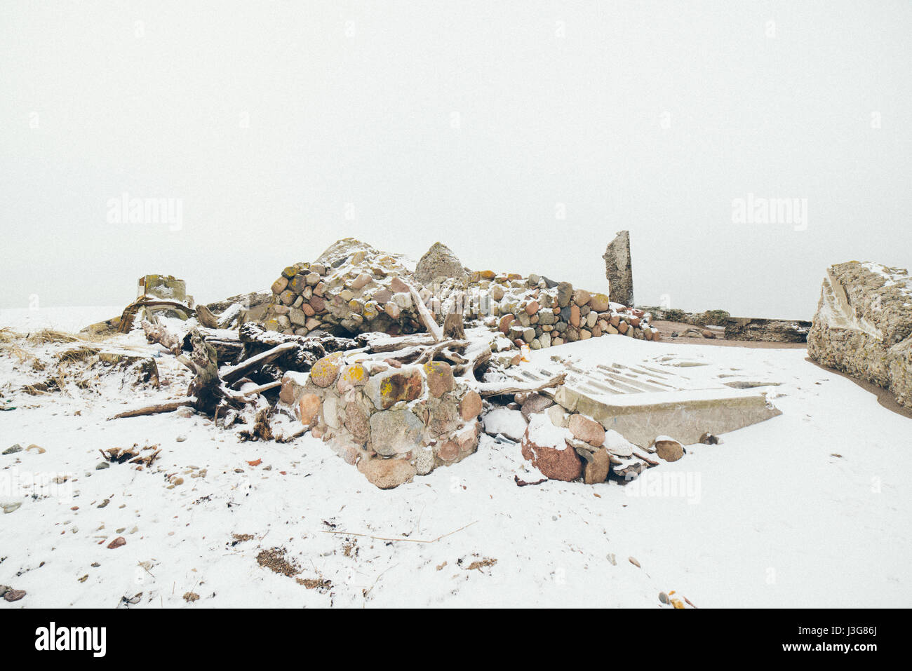 old war fort ruins on the beach in winter. Liepaja, Latvia- vintage ...
