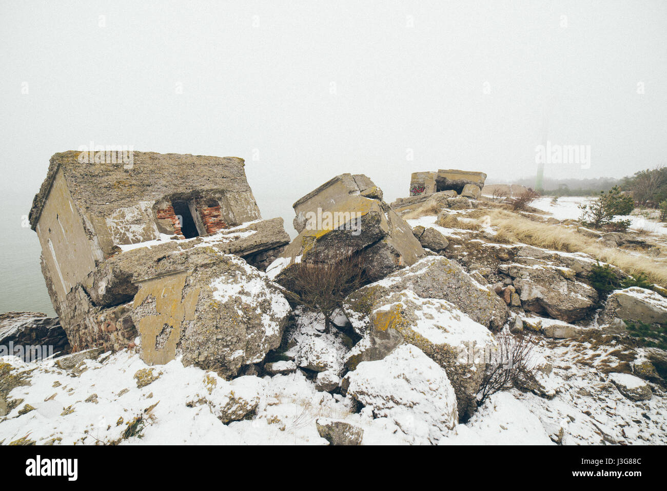 old war fort ruins on the beach in winter. Liepaja, Latvia- vintage ...