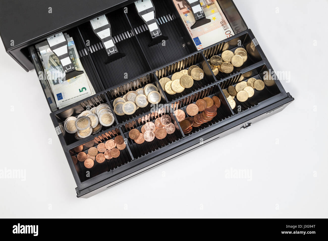 Cash register with money Stock Photo - Alamy