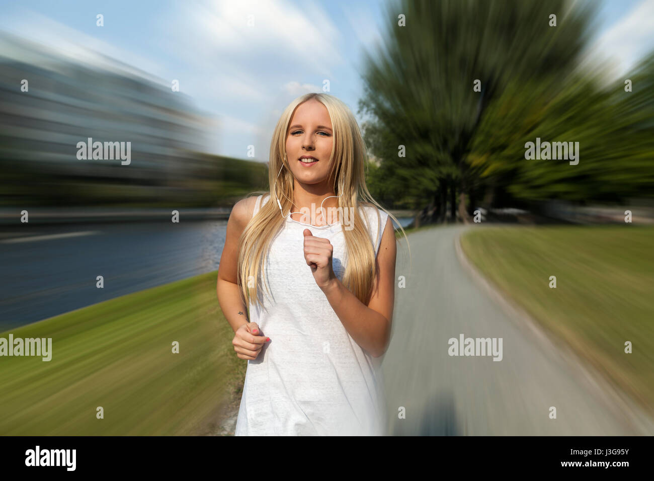 Blur young woman running hi-res stock photography and images - Alamy