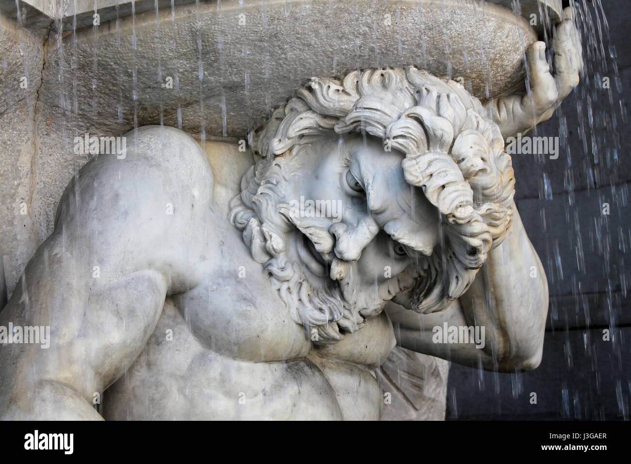A statue near the Hofburg Palace looks to be bearing a heavy load ...