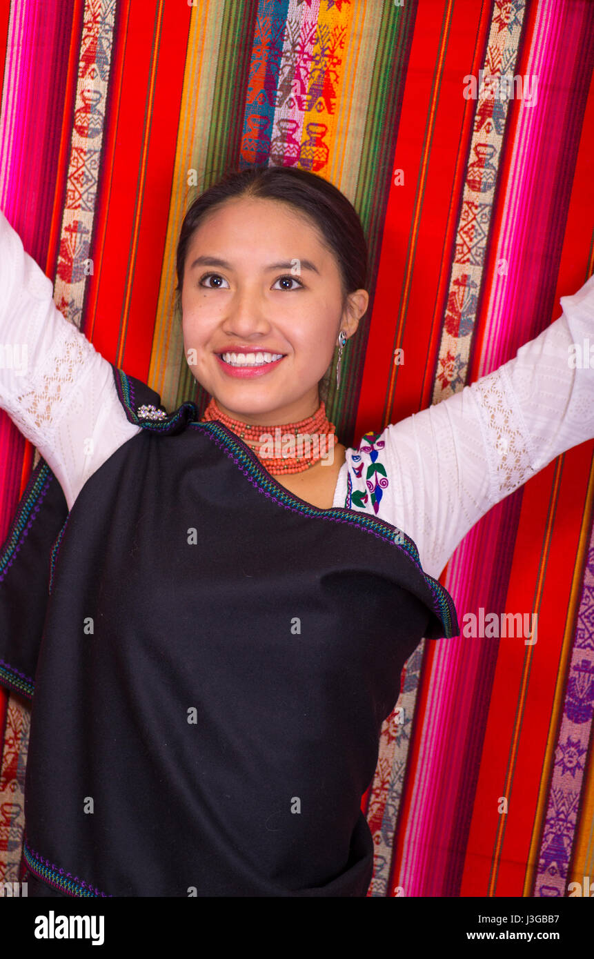 Beautiful Hispanic Model Wearing Andean Traditional Clothing Smiling