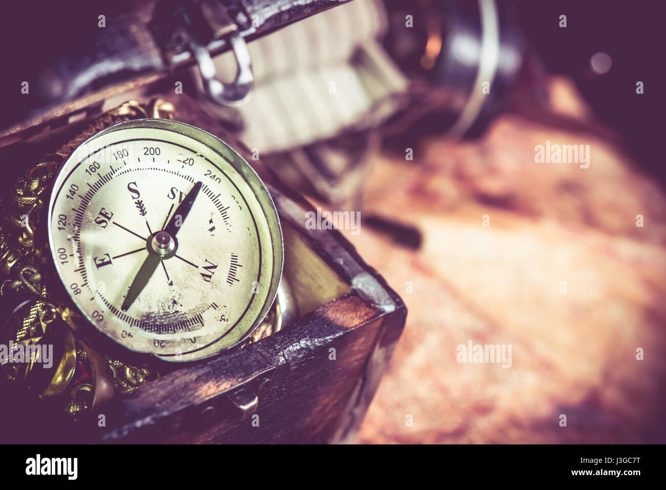 Columbus day and world map with compass Stock Photo - Alamy