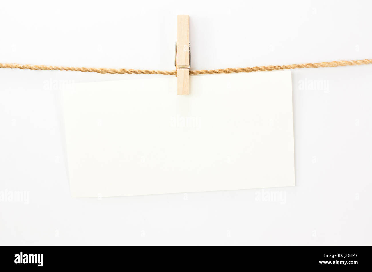 Notice card, white paper and wood clip on white background Stock Photo ...