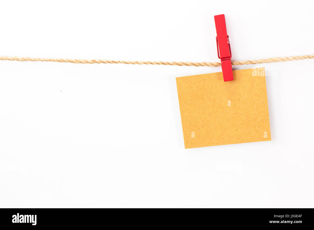 Notice card, brown paper and wood clips on white background Stock Photo ...