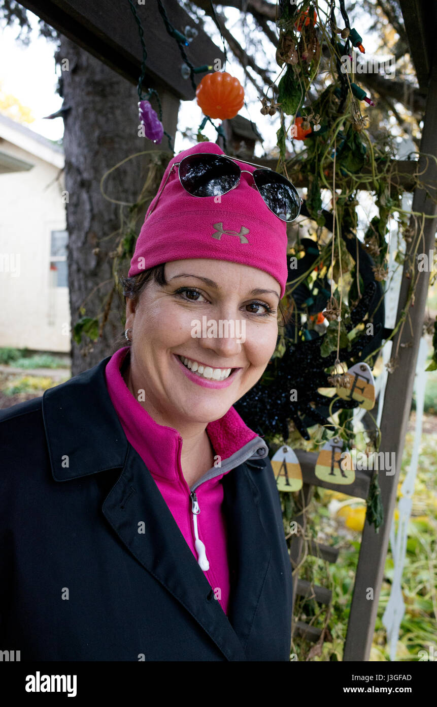 Attractive woman smiling with pink hat and shirt. St Paul Minnesota MN ...