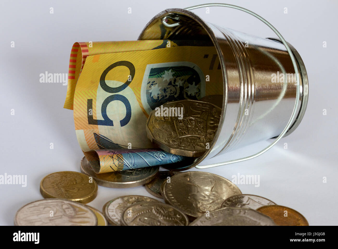 Australian cash in a silver bucket Stock Photo - Alamy