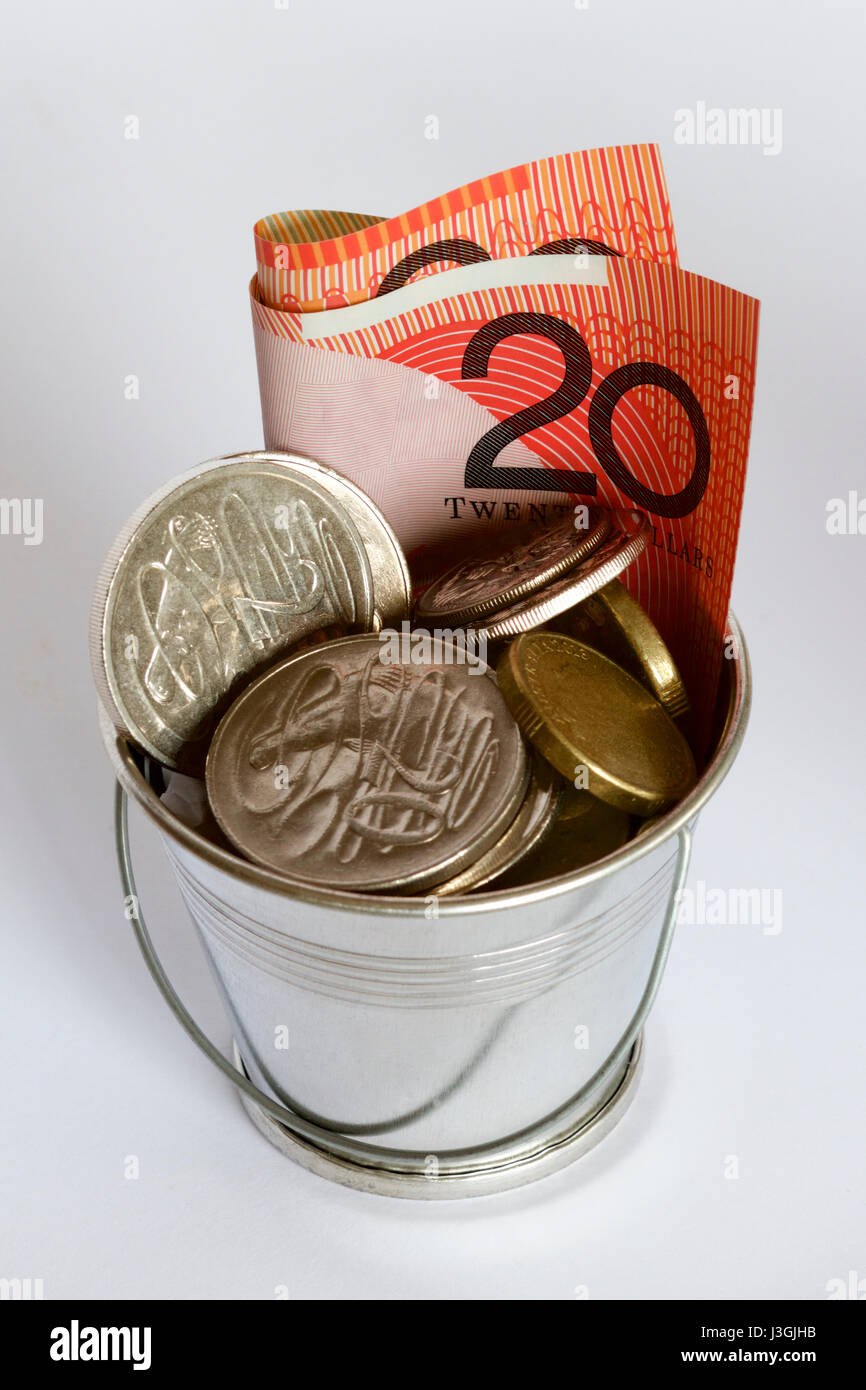 Australian twenty dollar notes and coins in a bucket Stock Photo - Alamy