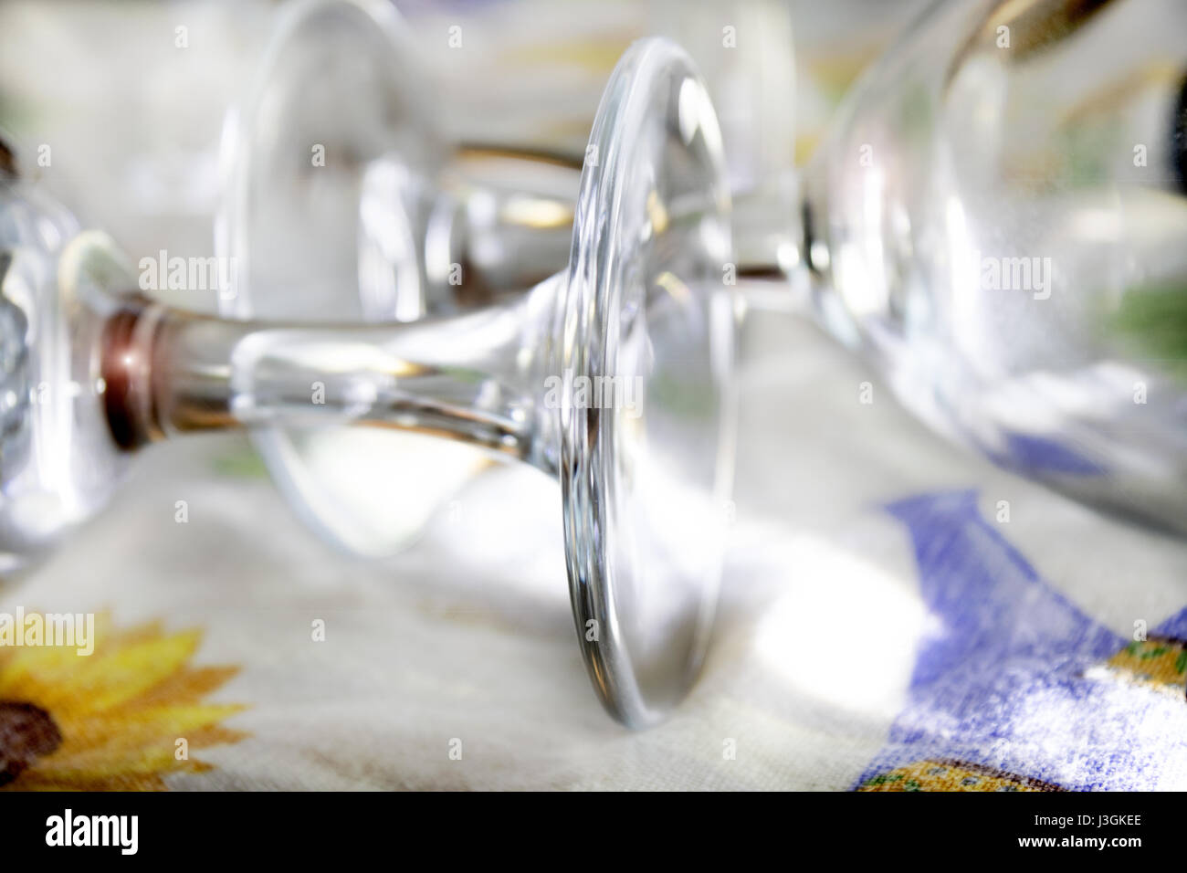 detail of stem and circular base of a crystal stemware for champagne ...
