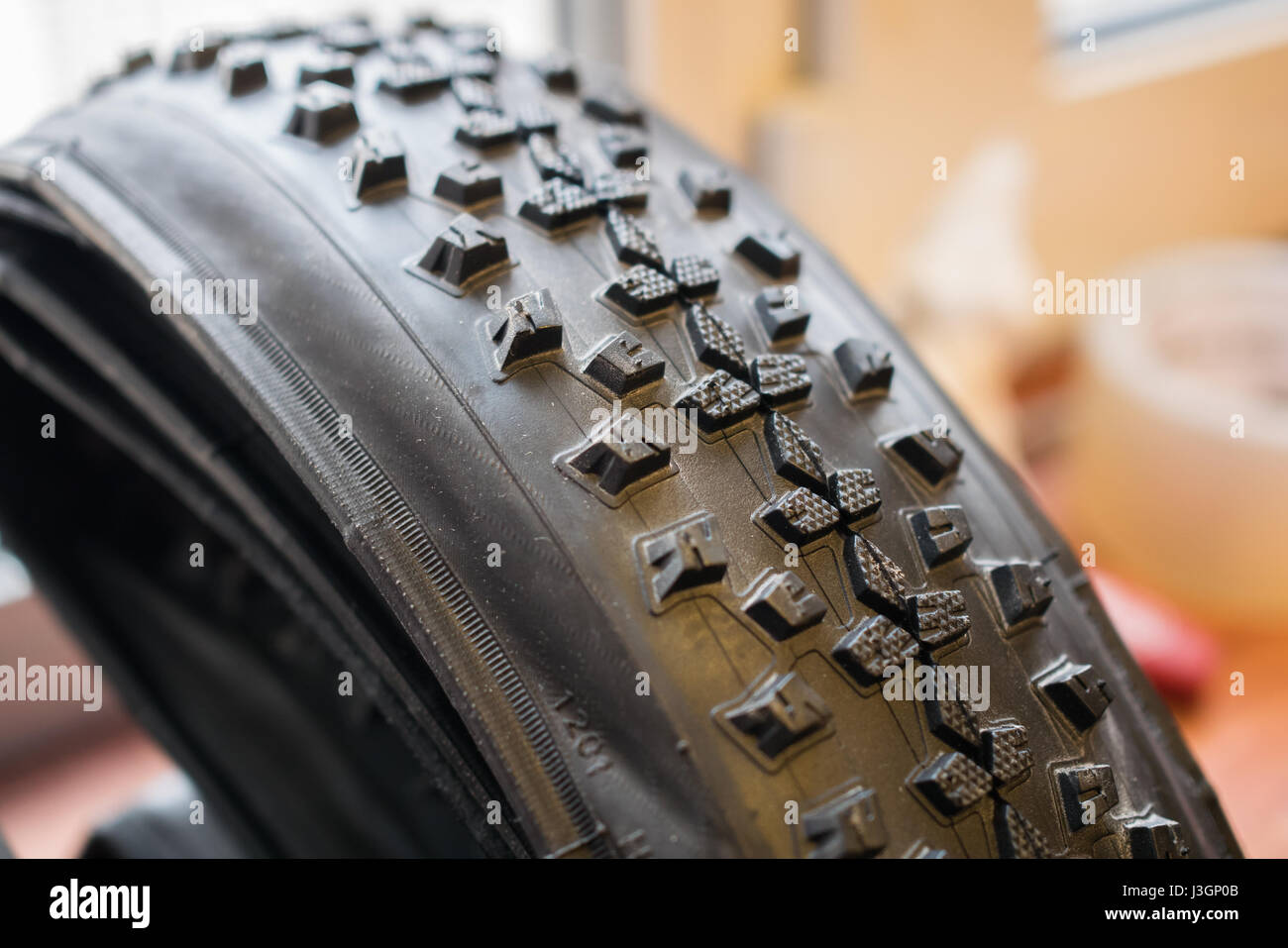 Photo of studded bicycle tire Stock Photo - Alamy