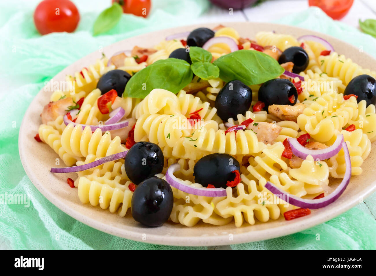 Pasta salad radiatori with chicken, black olives, blue onion, sweet ...