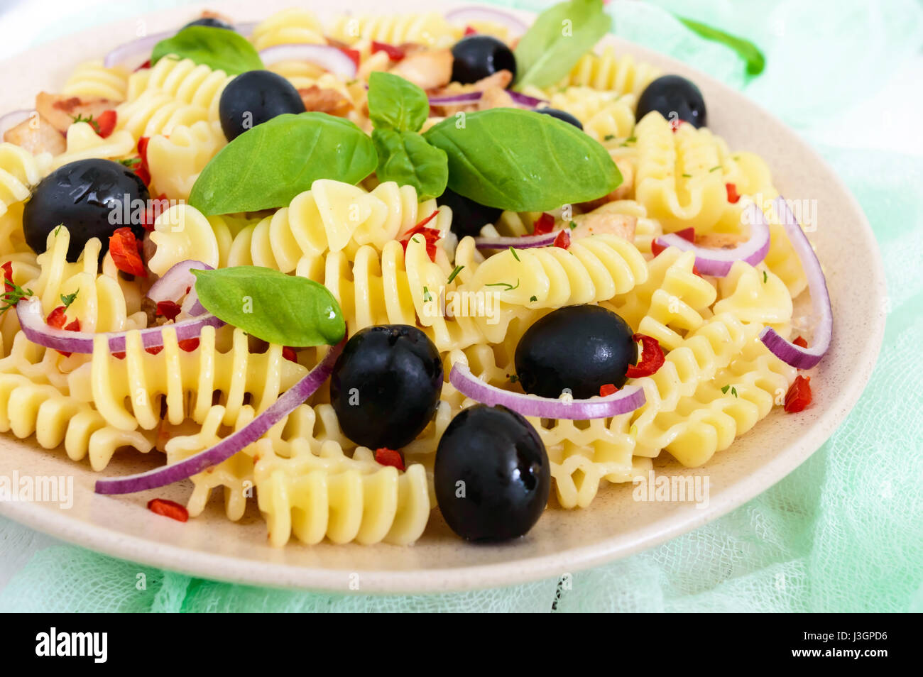 Pasta salad radiatori with chicken, black olives, blue onion, sweet ...