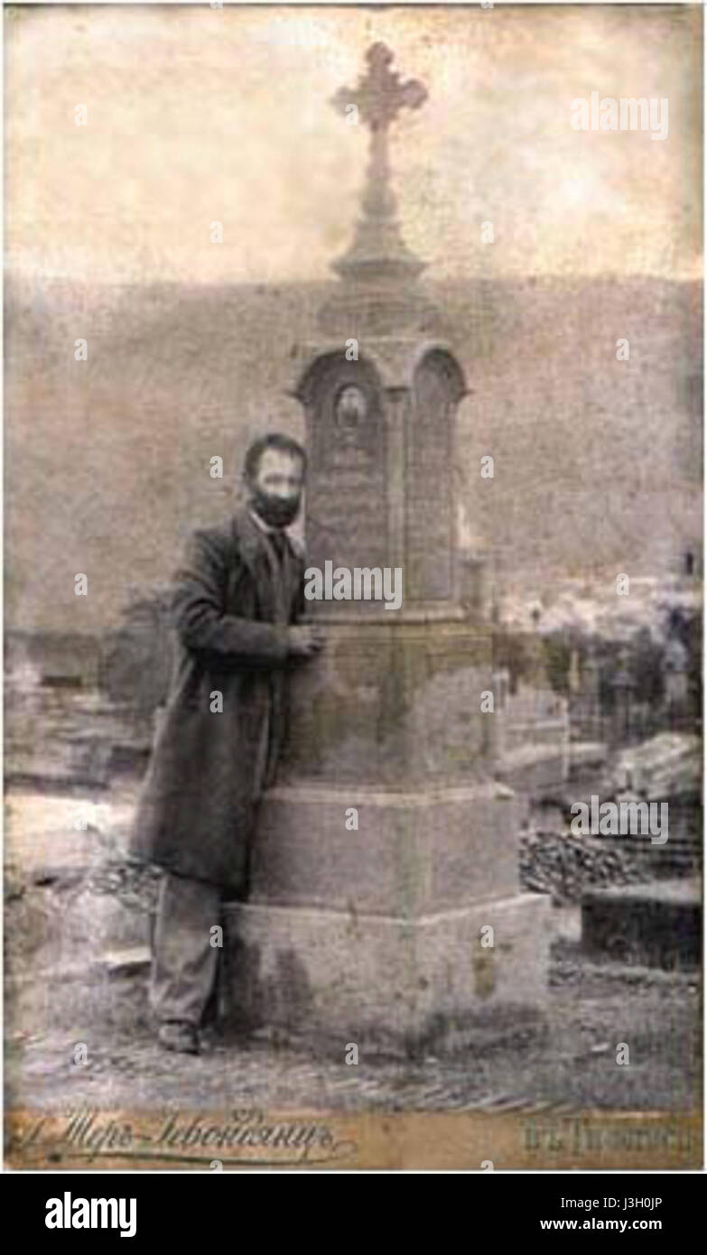 G. Ter Gevondiantze at the grave of his son in Khojavank cemetery Stock ...