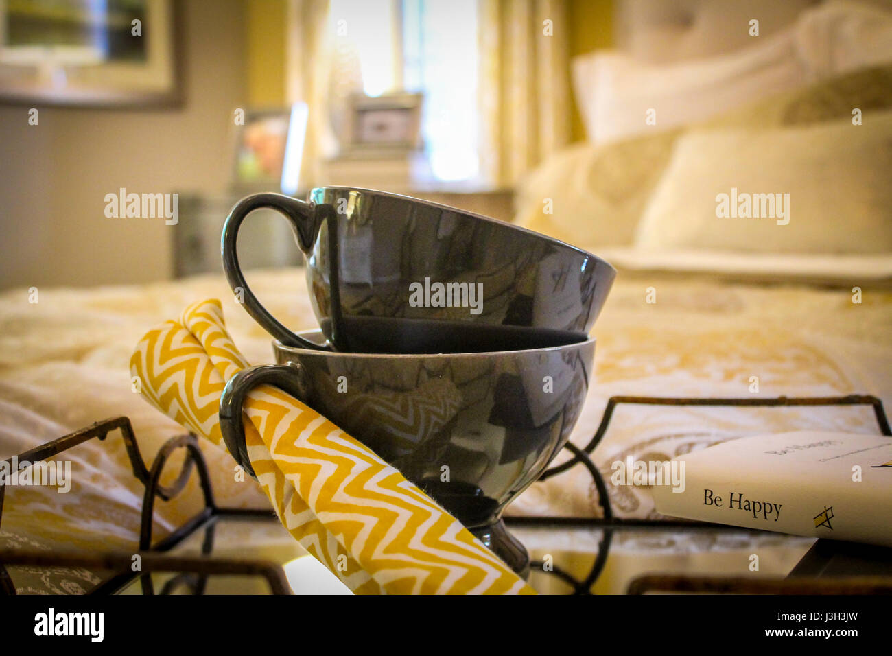 Tea Cups by the bedside Stock Photo - Alamy
