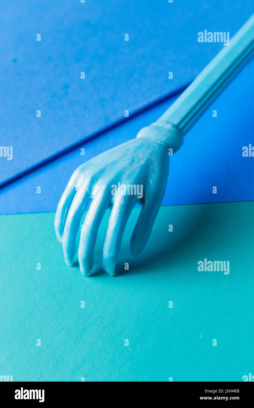 Her Life in Shades of Blue: Still Life of a plastic mini hand placed in ...