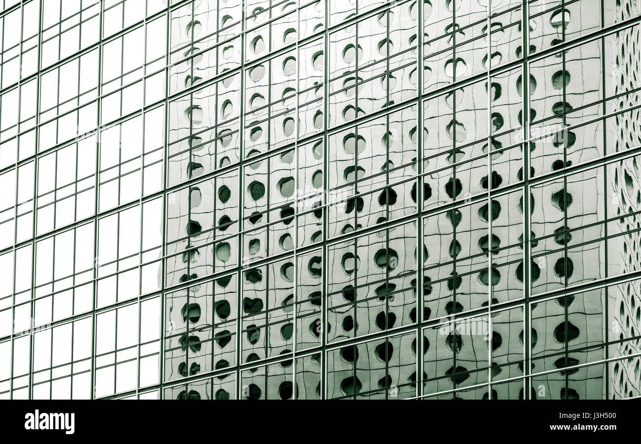 Modern office building detail, glass surface with green color Stock ...