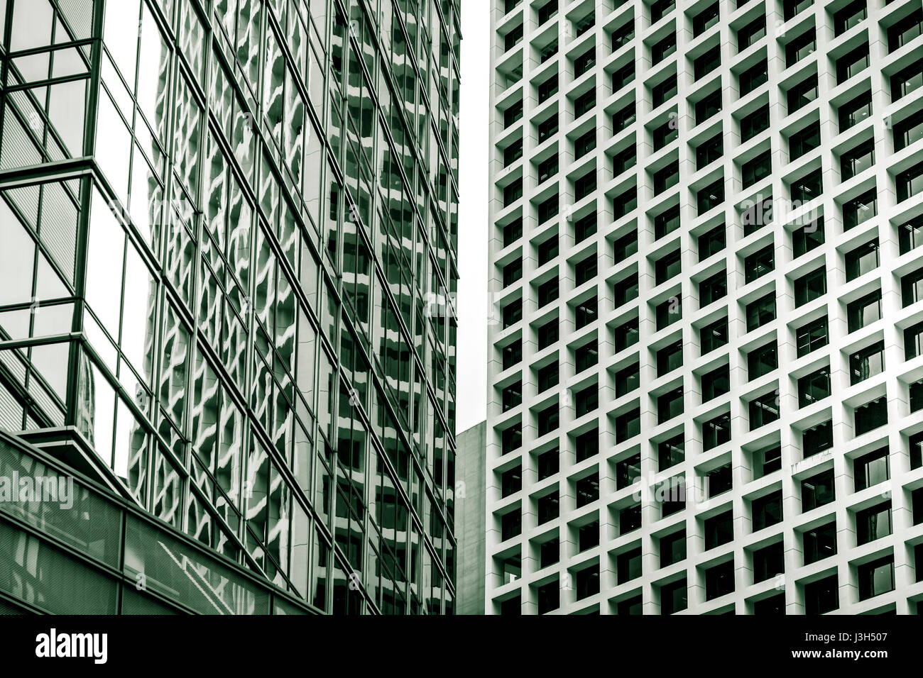 Modern office building detail, glass surface with green color Stock ...