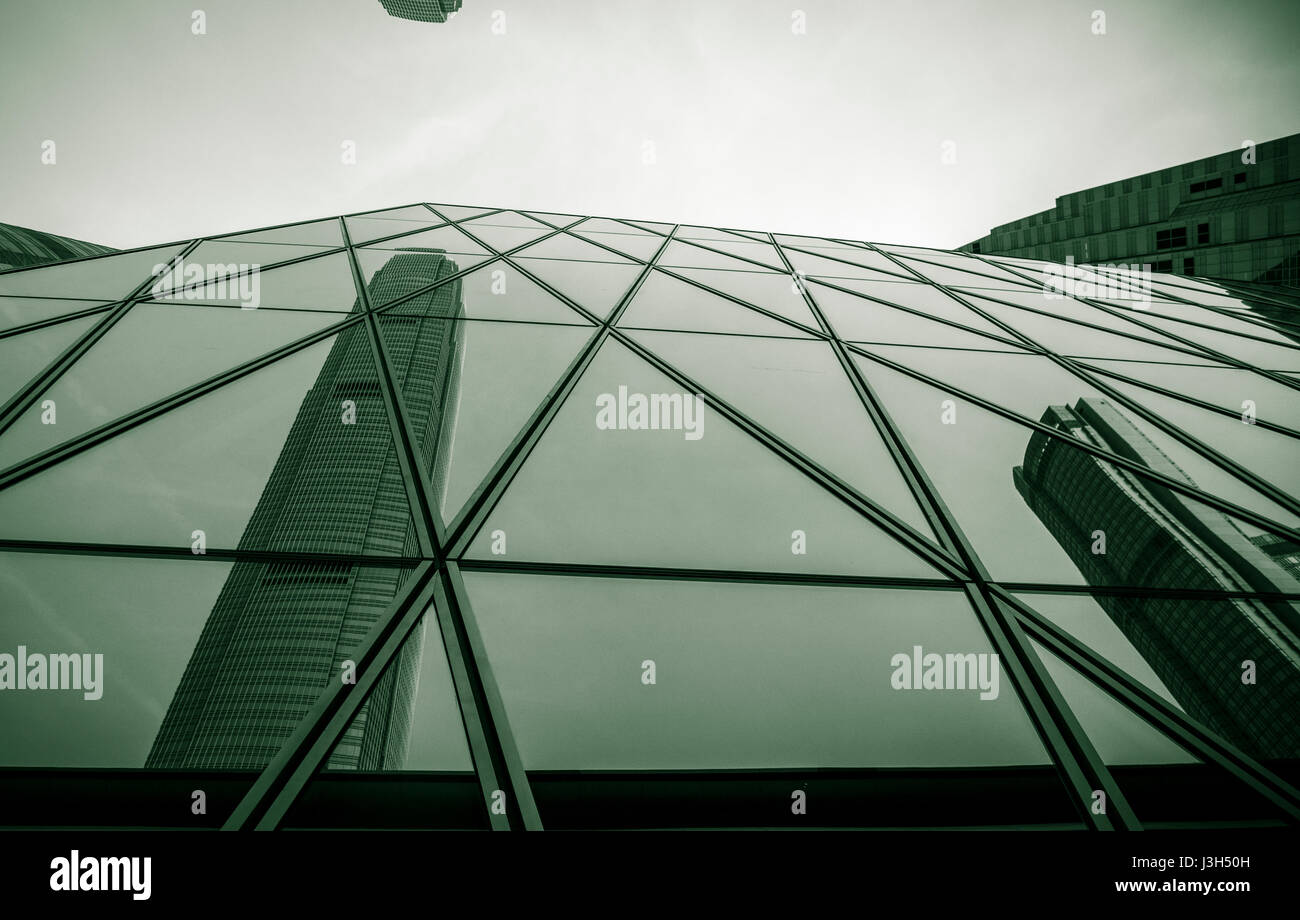 Modern office building detail, glass surface with green color Stock ...
